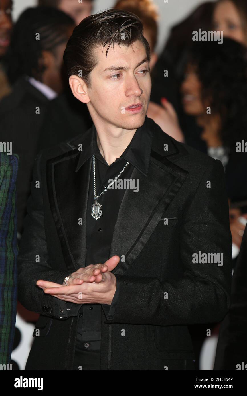 Alex Turner arrives at the BRIT Awards 2014 at the O2 Arena in London ...