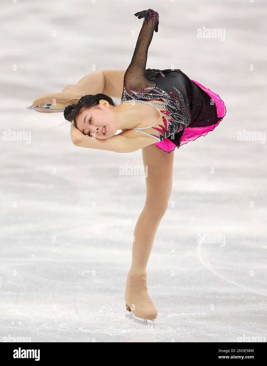 Li Zijun of China competes in the women's short program figure skating ...