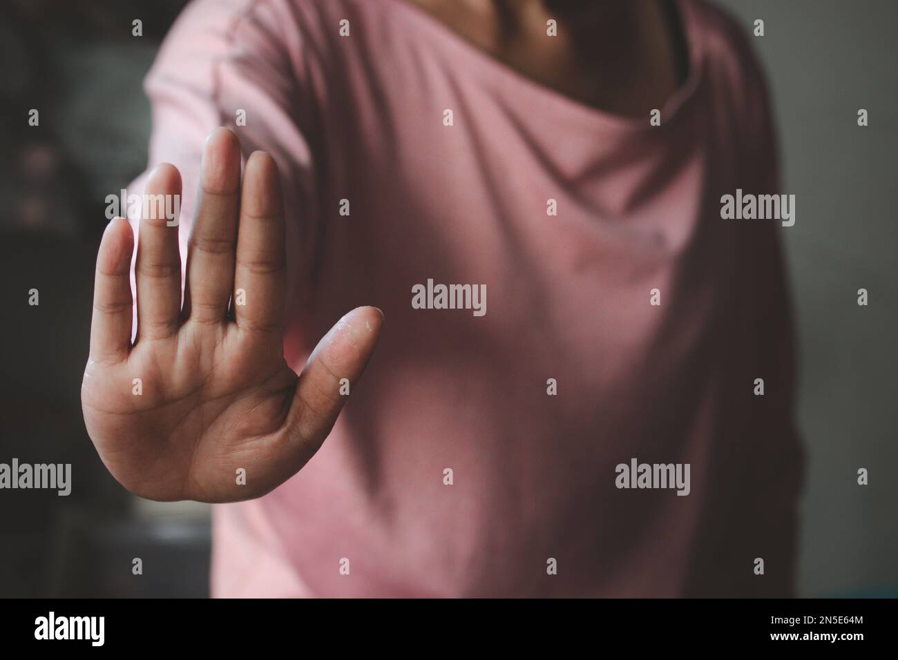 Hands of Asian women are prohibited. In gloomy tones being in denial ...