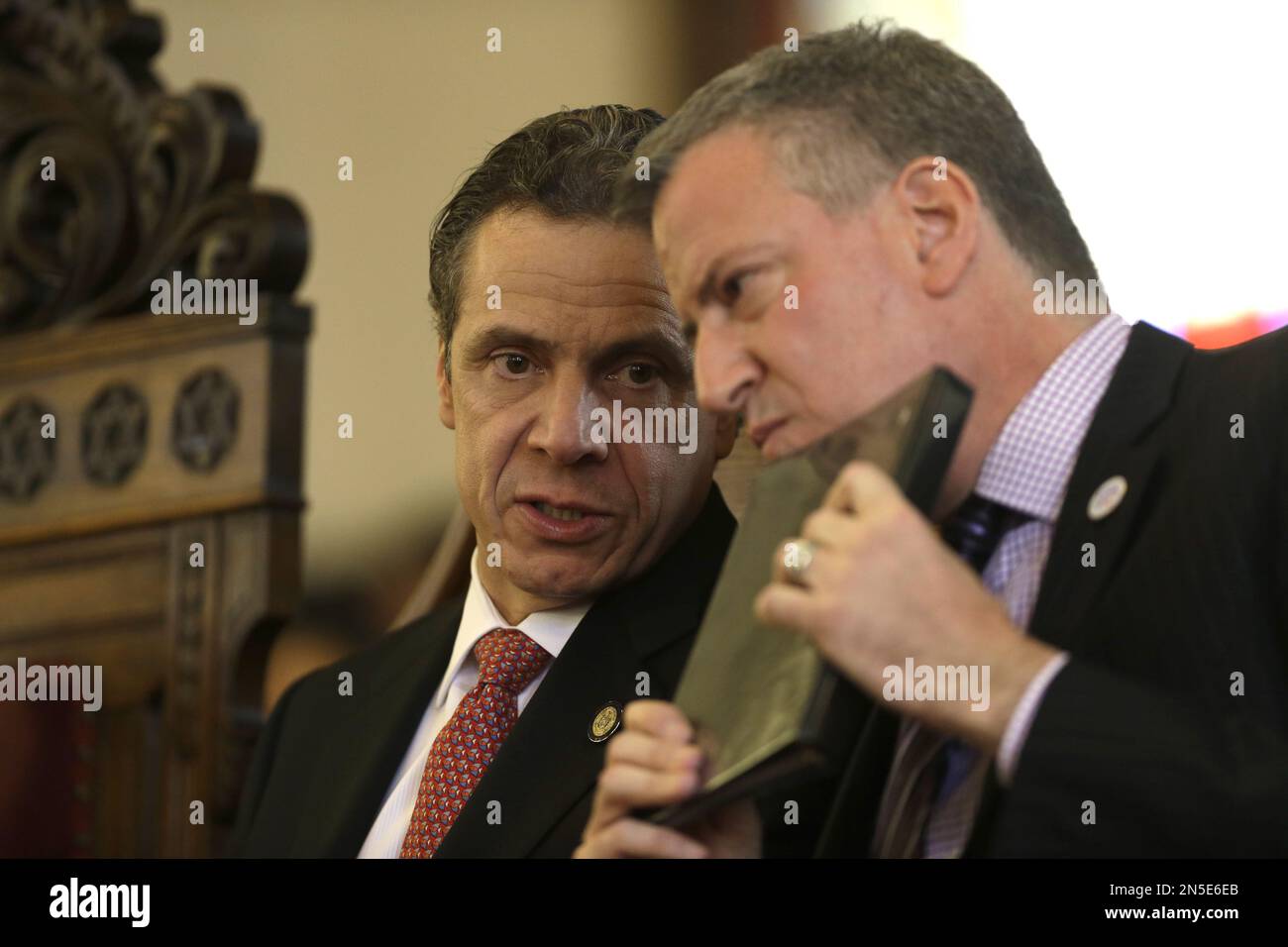 New York Gov. Andrew Cuomo, left, and New York City Mayor Bill de ...