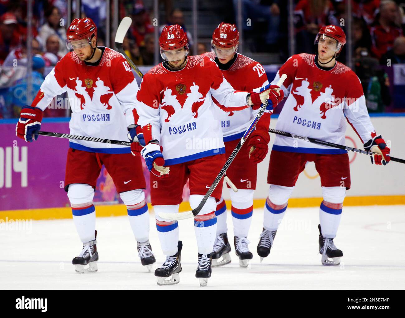 Team Russia skates back on the ice after a break in the third period of ...