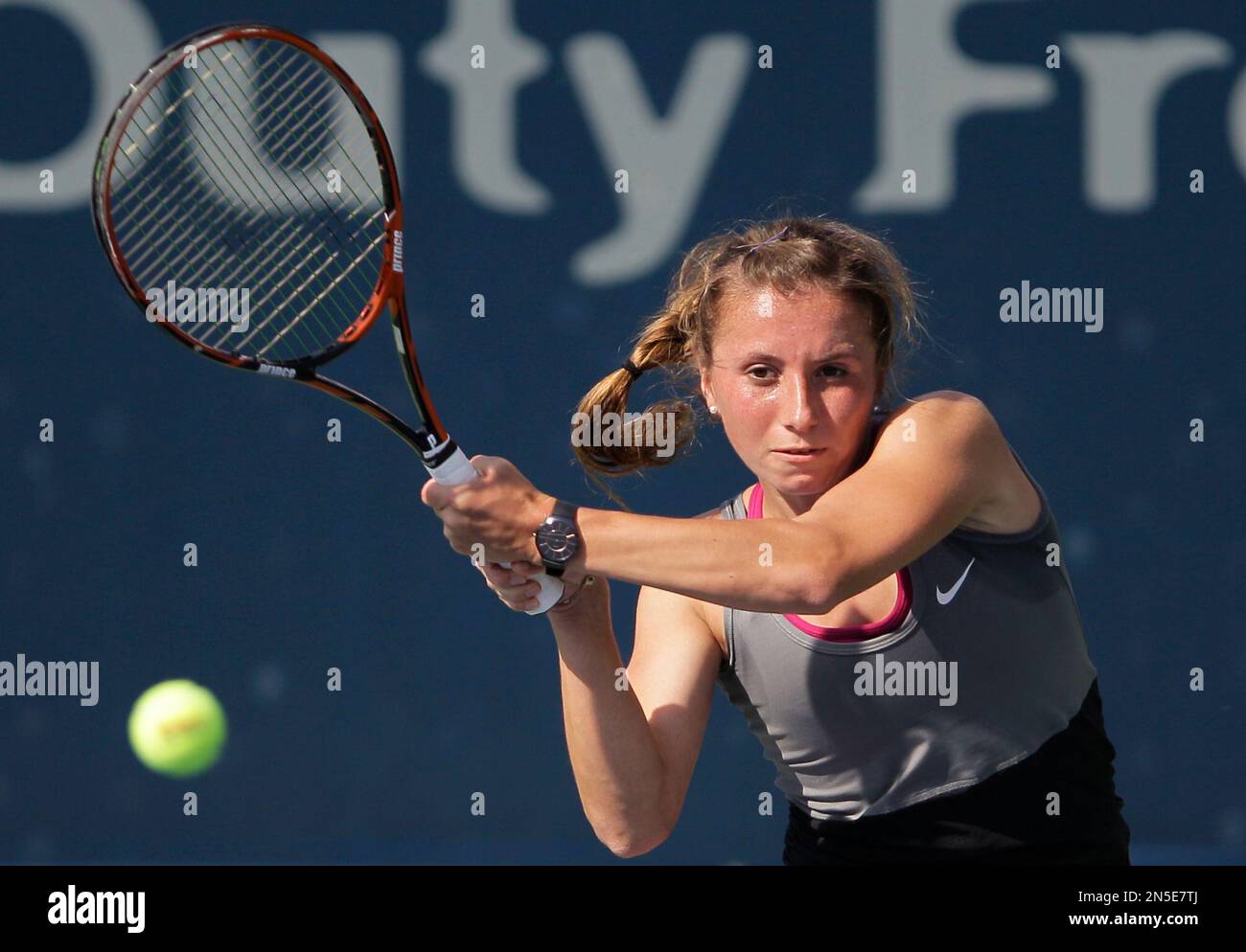 Annika Beck of Germany returns the ball to Caroline Wozniacki of ...
