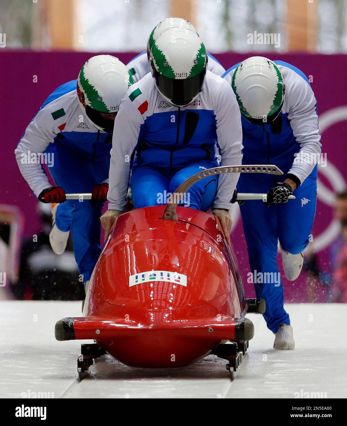 The team from Italy ITA-1, piloted by Simone Bertazzo, start a run ...