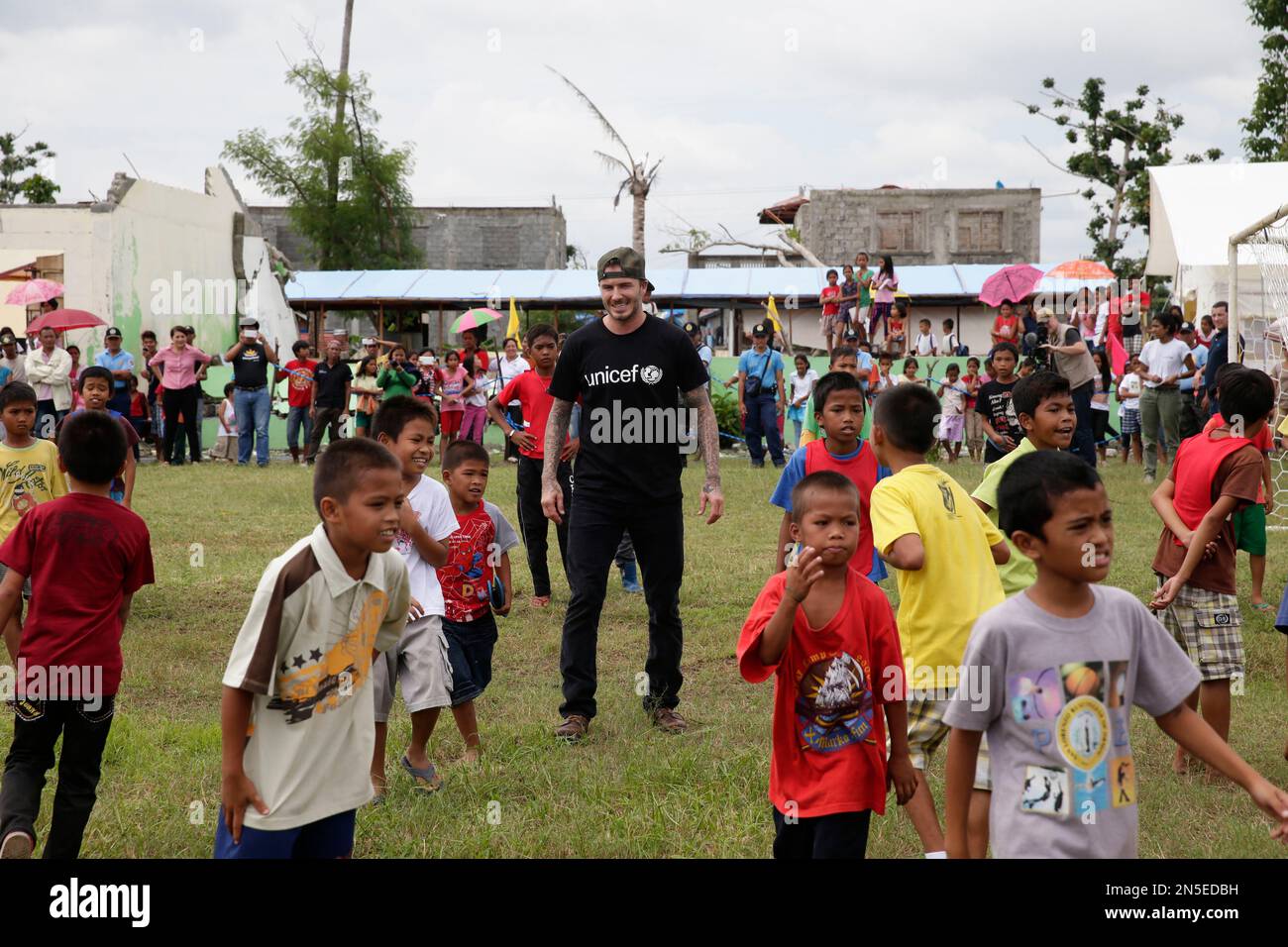 Former England soccer team captain David Beckham plays soccer with ...