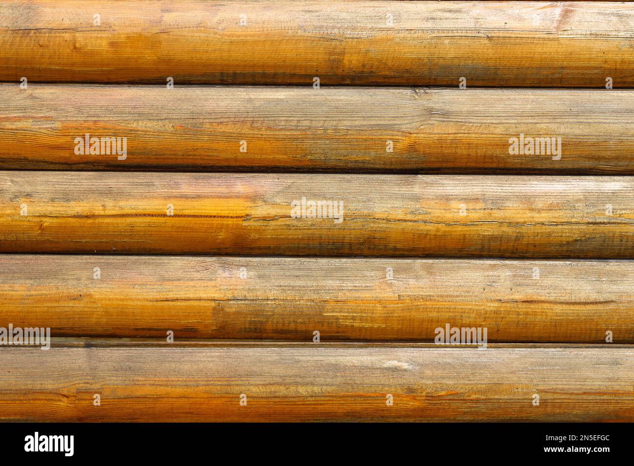 wooden wall made of natural logs Stock Photo - Alamy