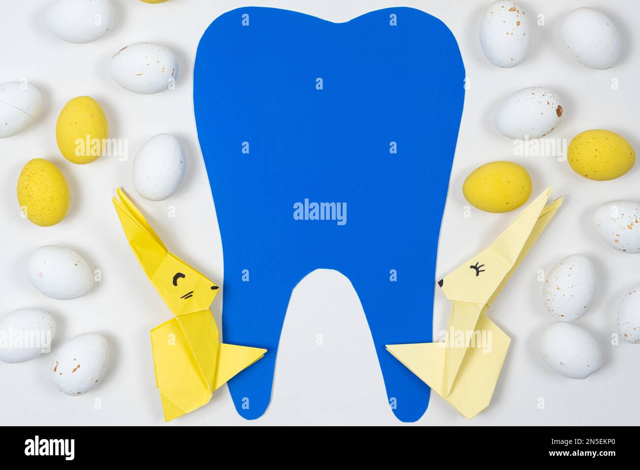 Easter and dentistry - tooth and hares made of paper, origami and ...