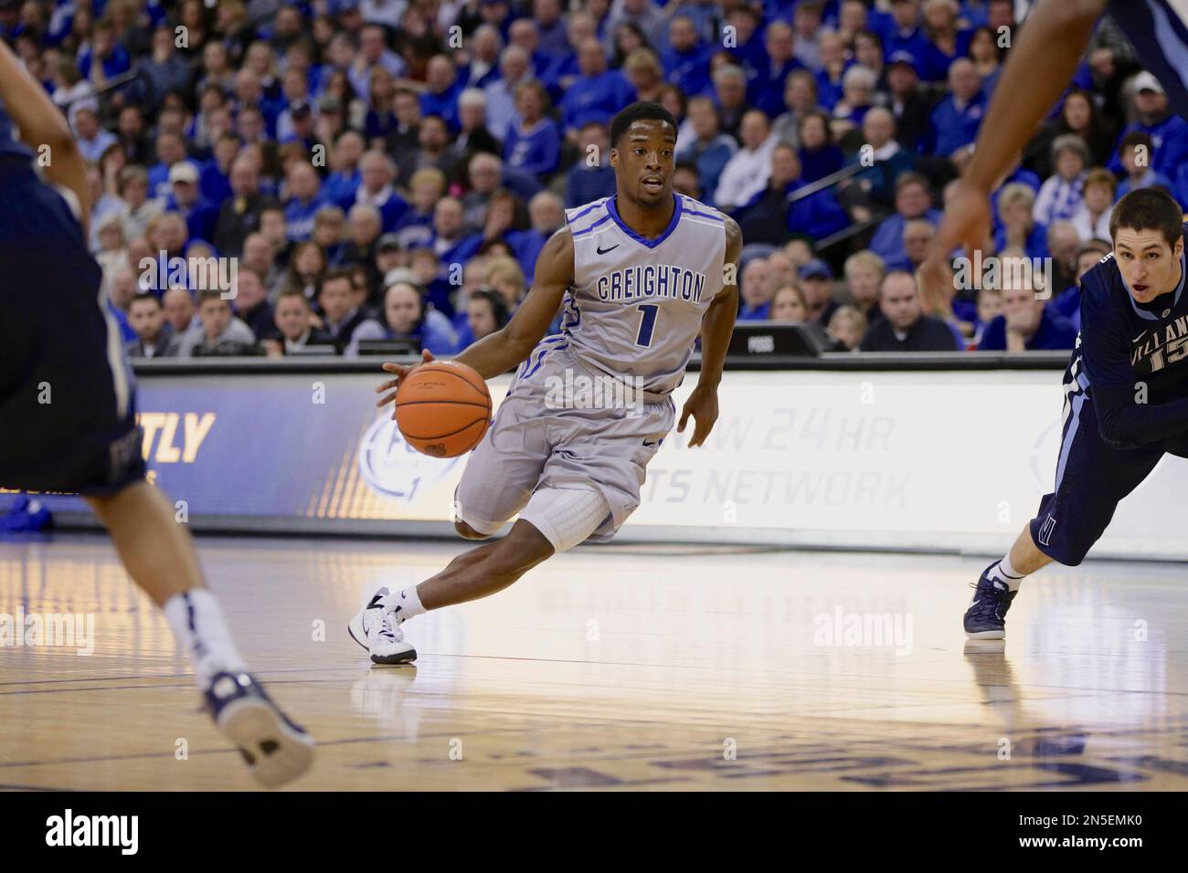 Creighton's Austin Chatman (1) drives to the basket with Villanova's ...