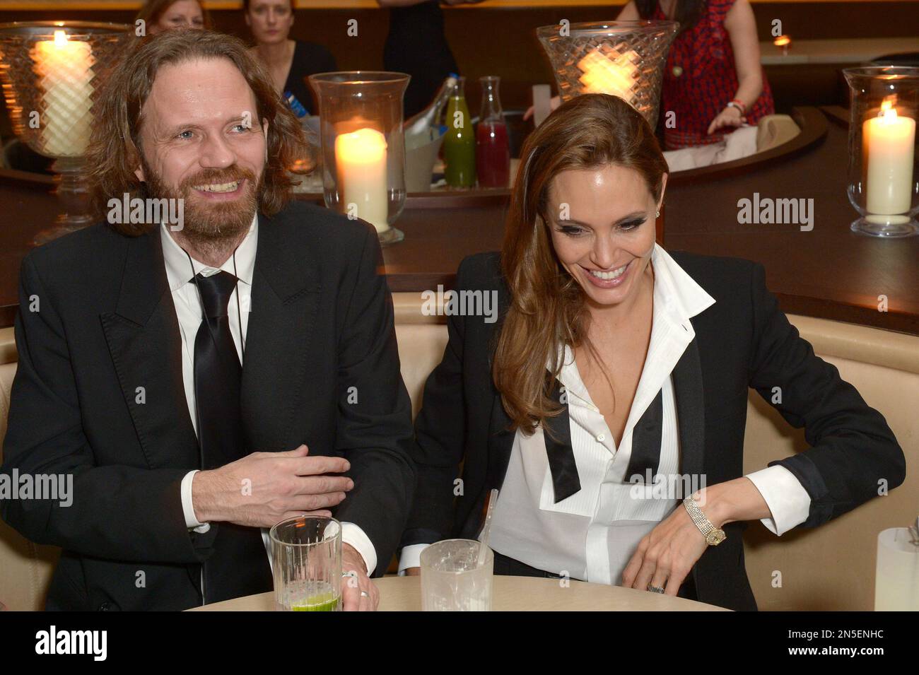 Piers Dunn and Angelina Jolie attend the EE British Academy Film Awards ...