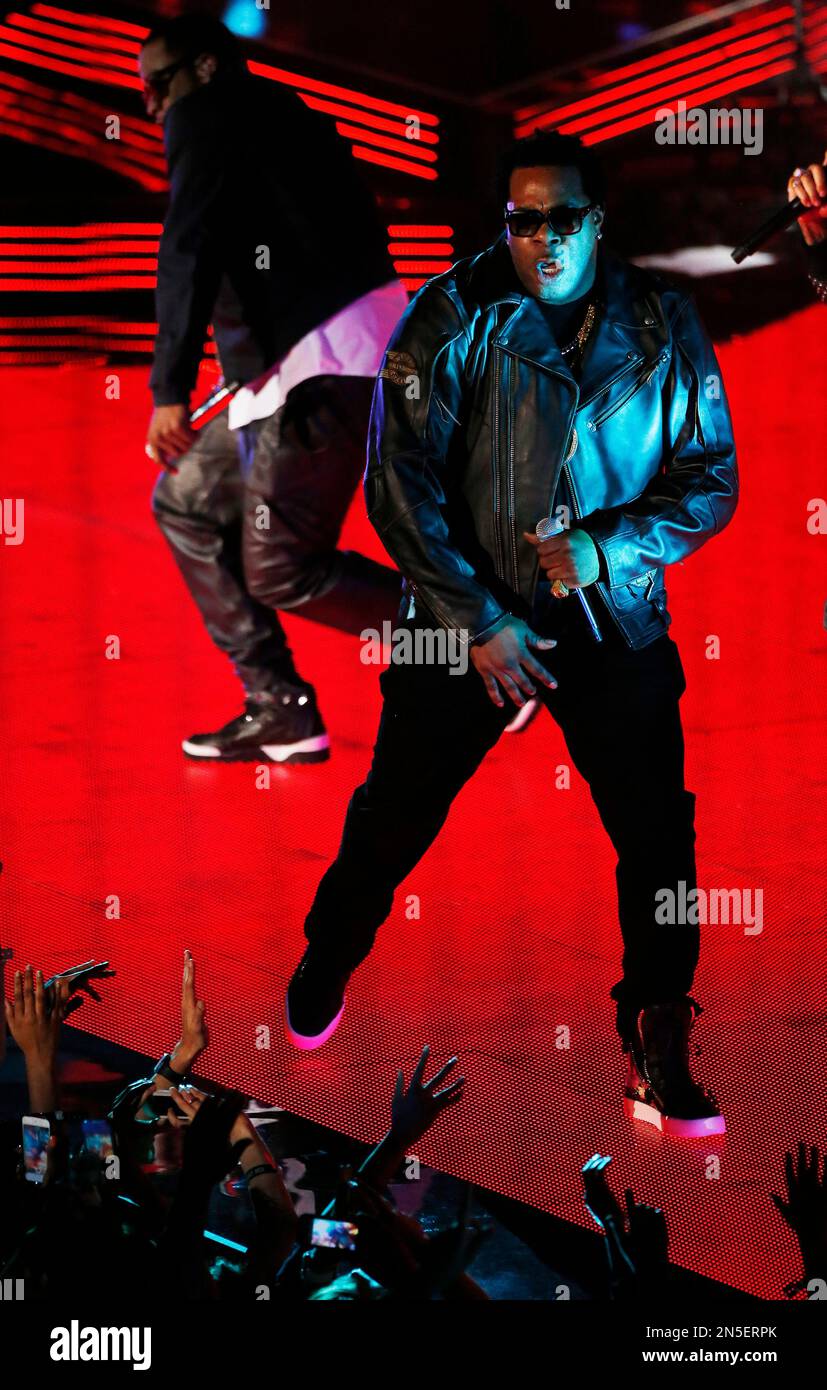 Rappers P Diddy, left and Busta Rhymes perform before the NBA All Star ...