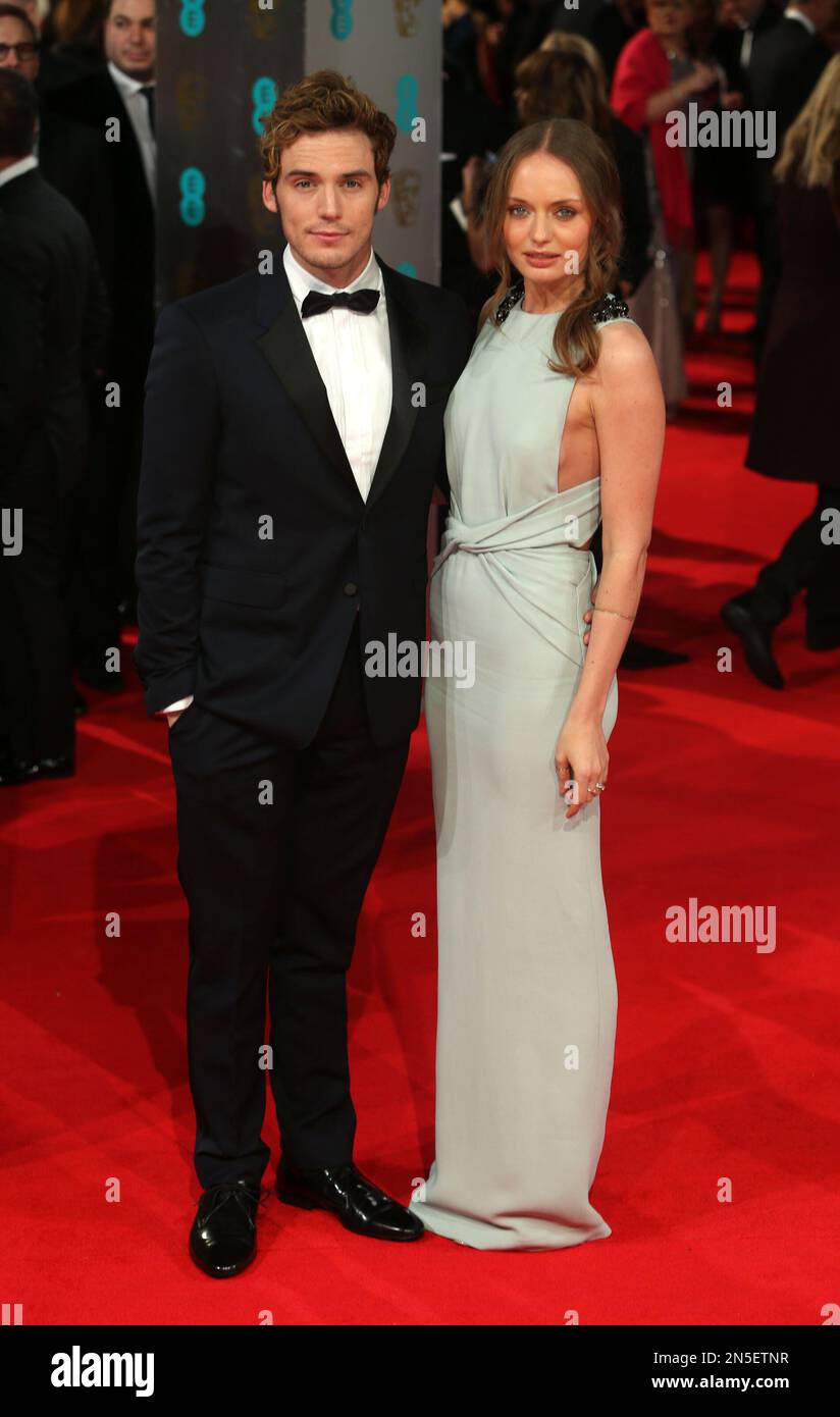 Sam Claflin and Laura Haddock poses for photographers on the red carpet ...