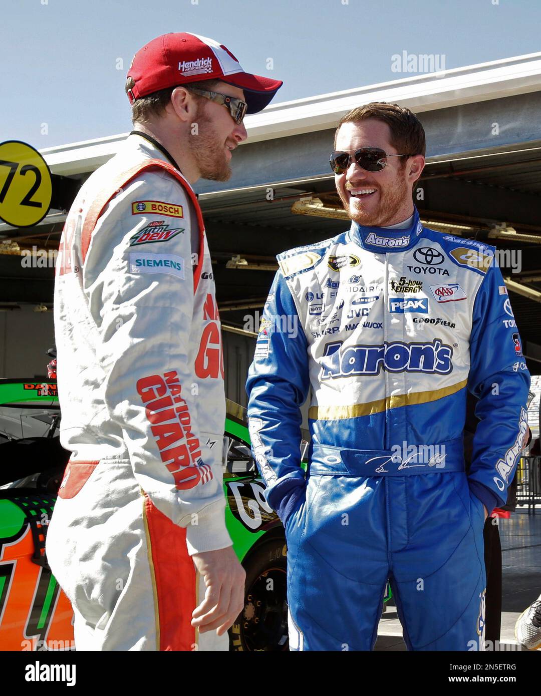 Dale Earnhardt Jr., left, and Brain Vickers talk after qualifying for ...