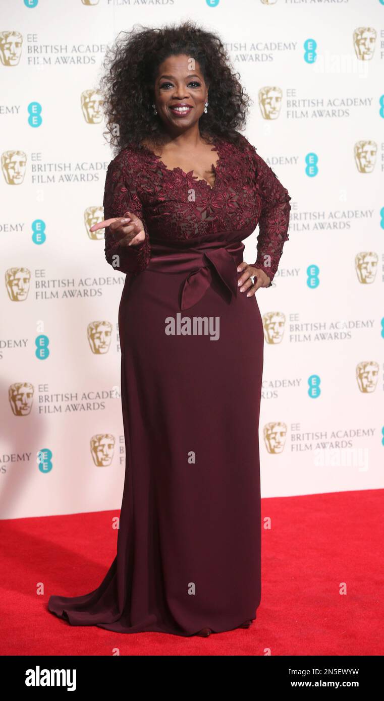 Oprah Winfrey poses for photographers in the winners room at the EE ...