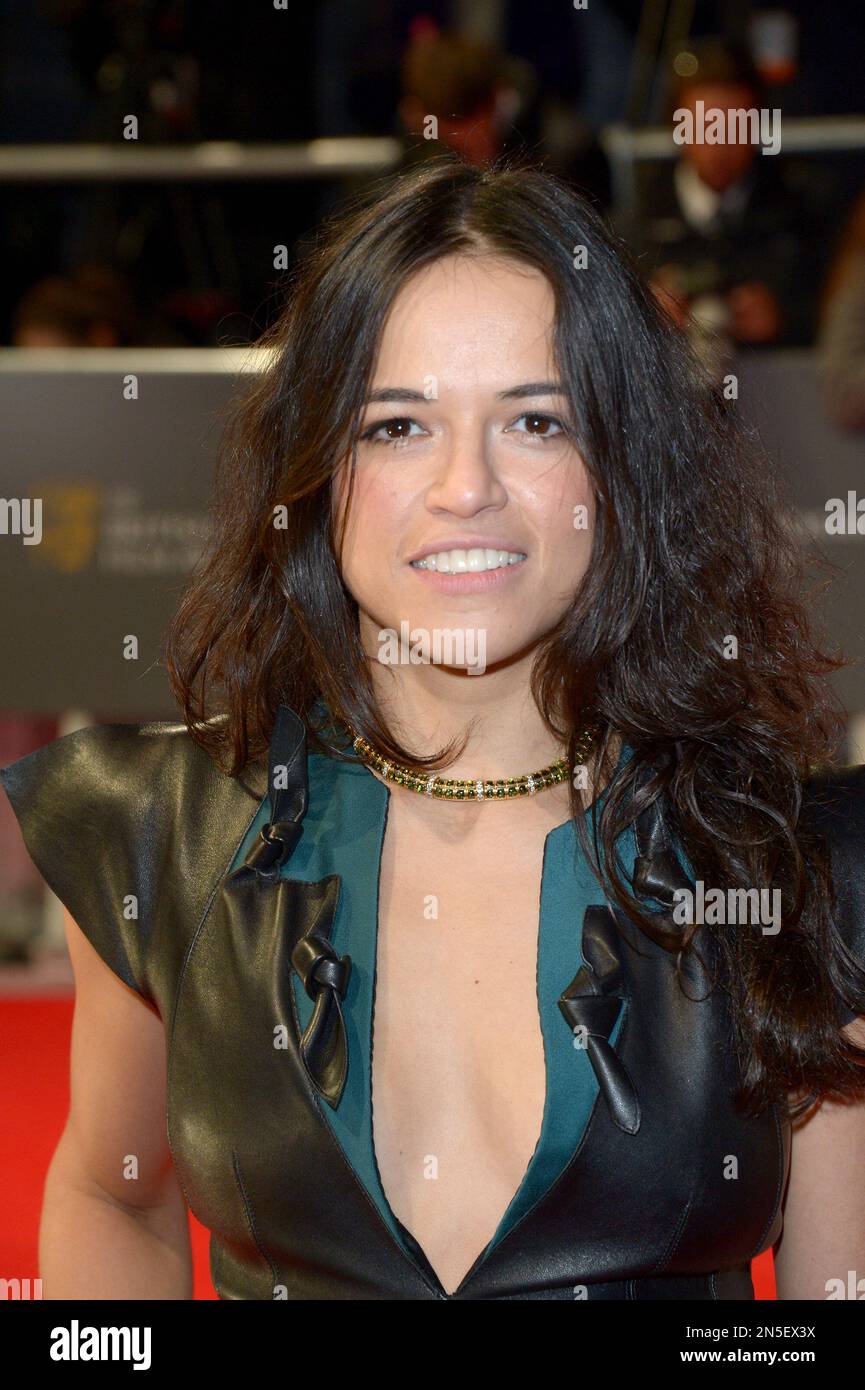 Actress Michelle Rodriguez poses for photographers on the red carpet at ...