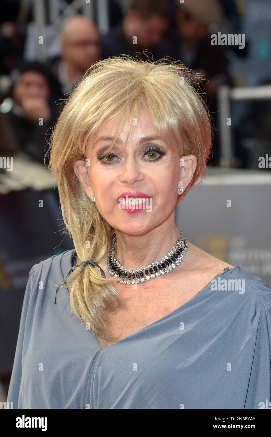 Sally Farmiloe poses for photographers on the red carpet at the EE ...