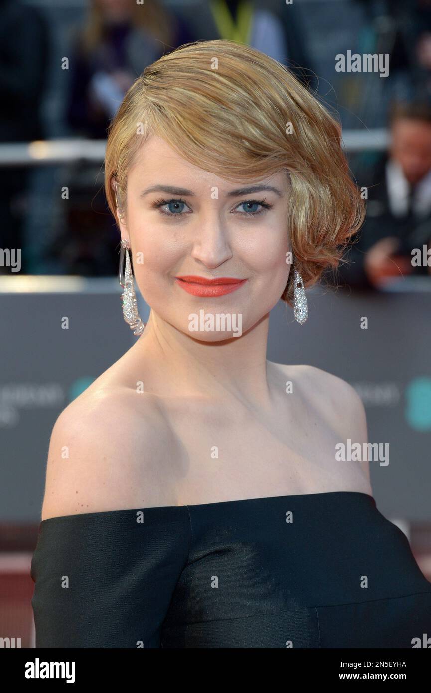 Antonia O'Brien poses for photographers on the red carpet at the EE ...