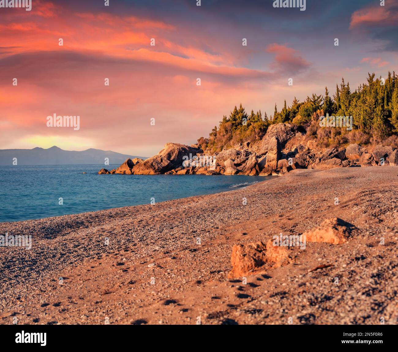 Start of the vacation season. Warm summer evening on Livadhi beach ...