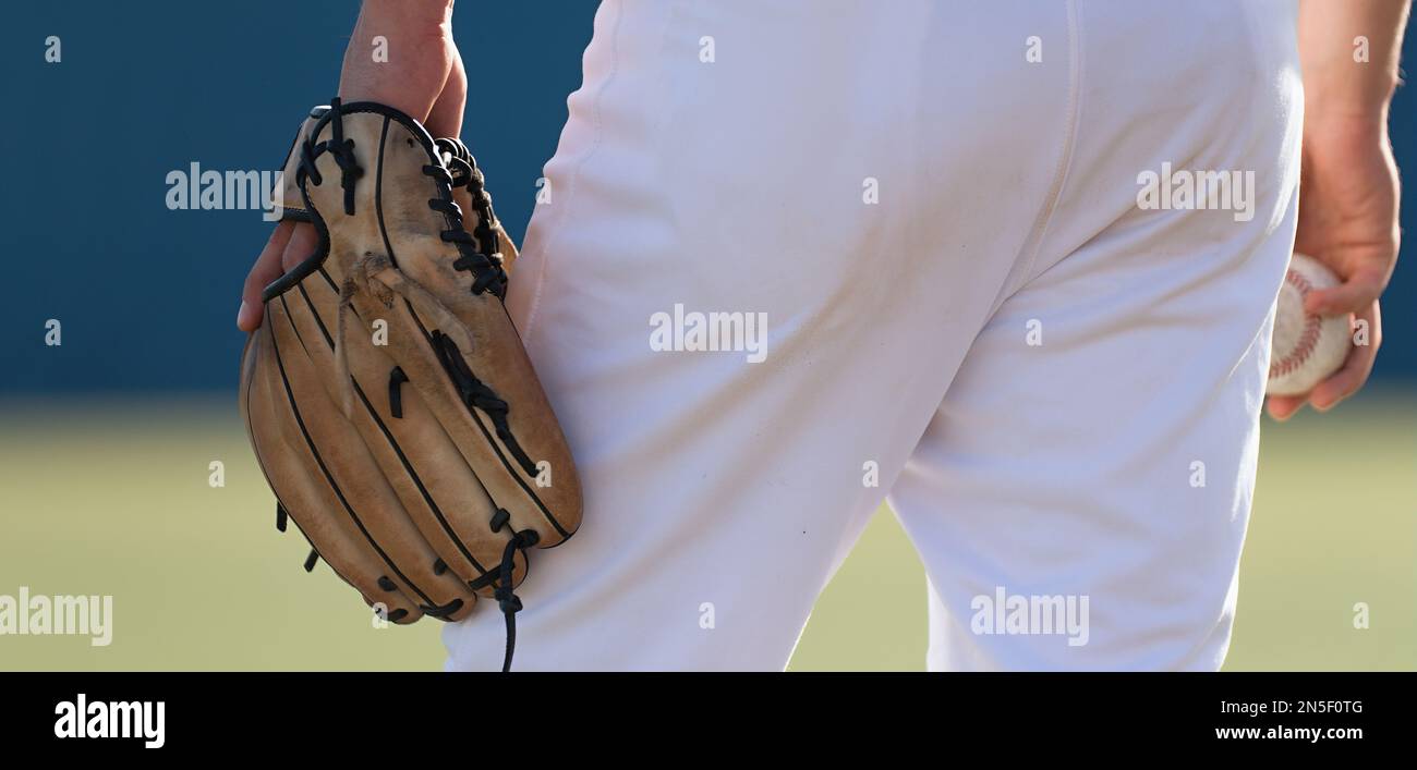 Baseball pitcher ready to pitch in baseball game, college softball ...