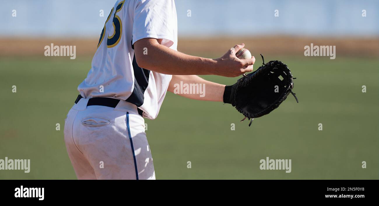 Baseball pitcher ready to pitch in baseball game, college softball ...