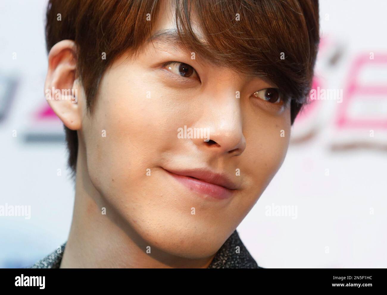 South Korean actor and model Kim Woo Bin smiles during a fan meeting in ...