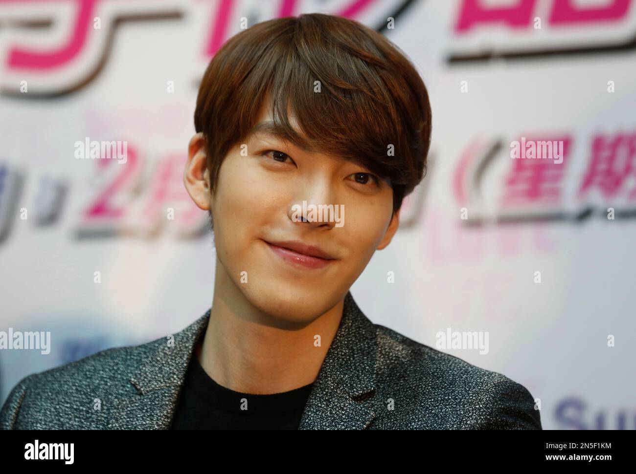 South Korean actor and model Kim Woo Bin smiles during a fan meeting in ...