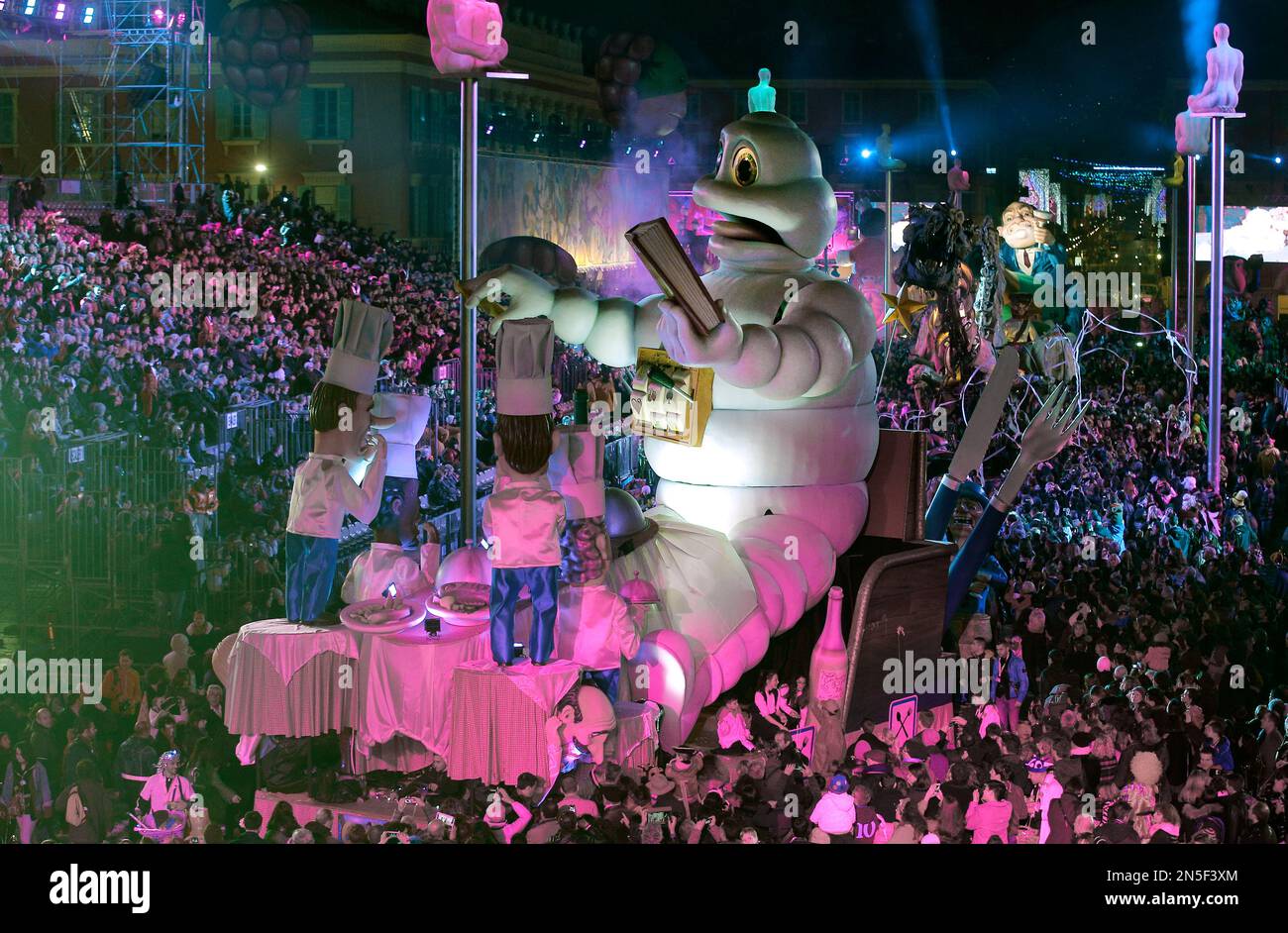 A float depicting Bibendum of Michelin, parades during the 130th ...