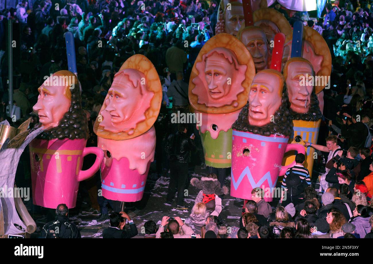 Floats depicting President of Russia Vladimir Putin parade during the ...