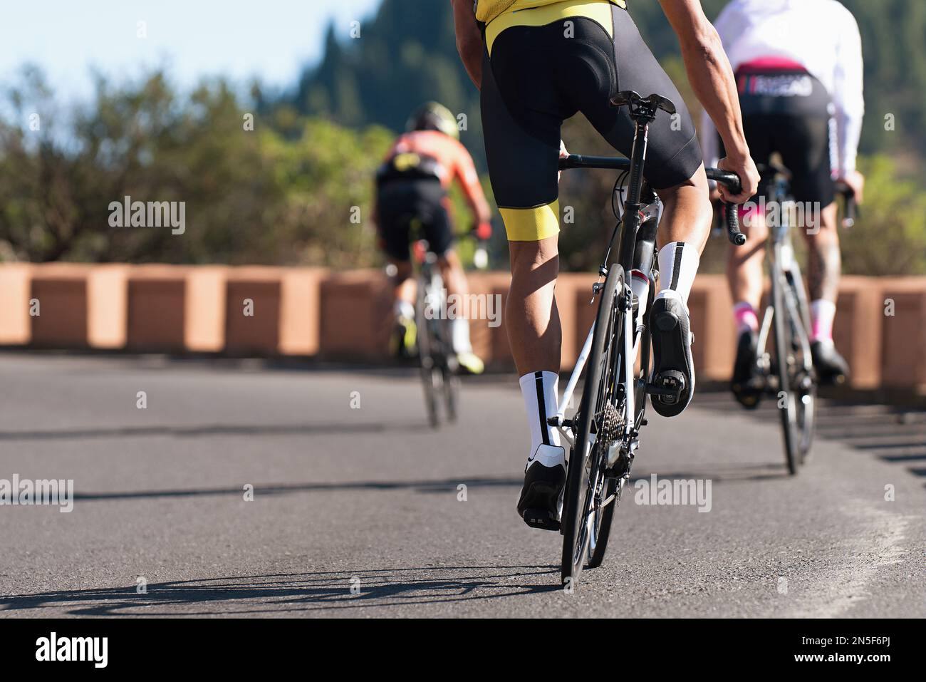 Group of cyclist at professional race, cyclists in a road race stage ...