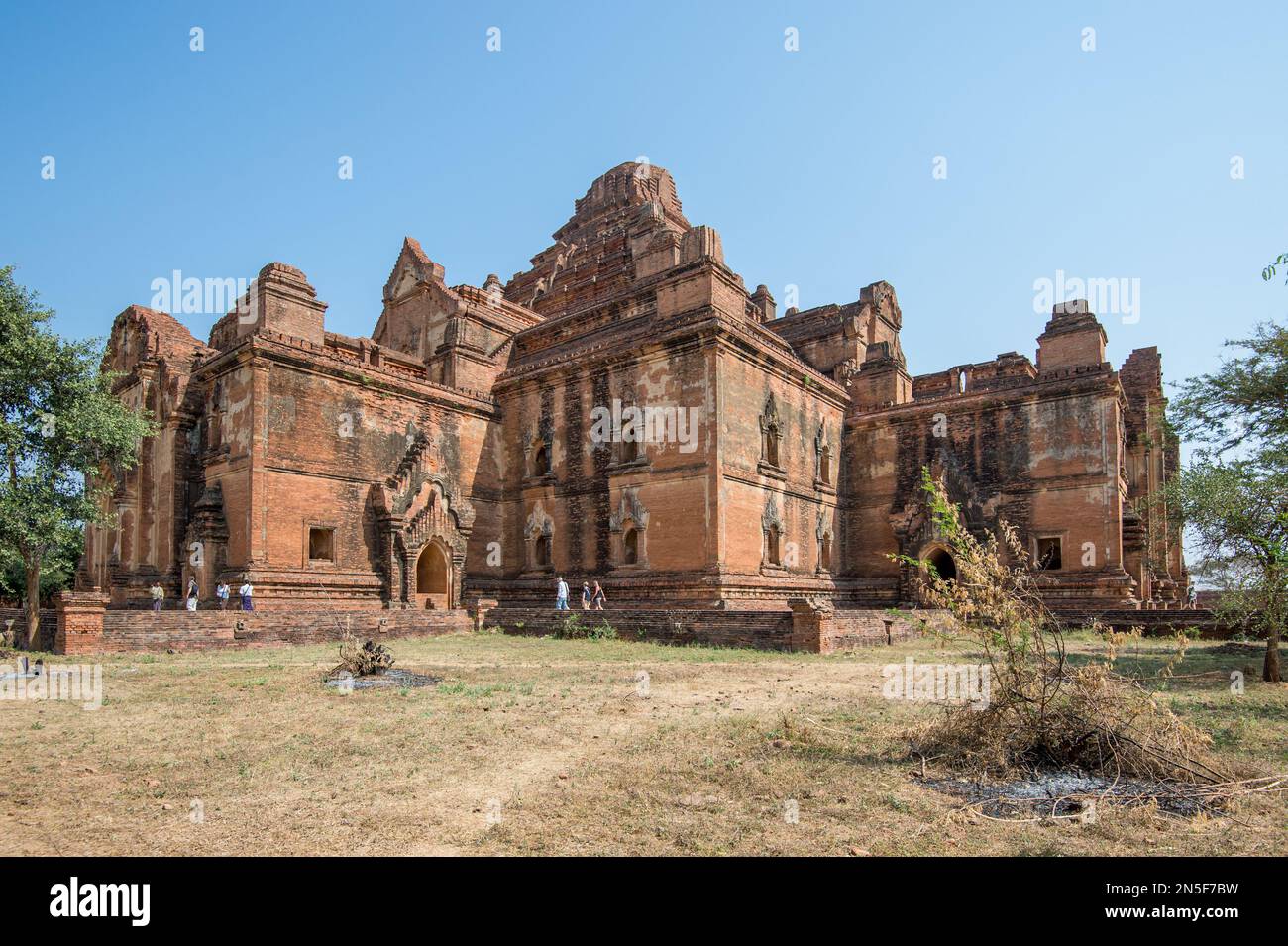 Burmese woman with child at Dhammayangyi temple in Bagan. Dhammayangyi ...