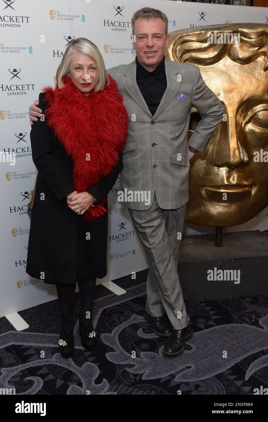 Betty Bright and Graham McPherson (Suggs) arrives for the BAFTA Fellow ...