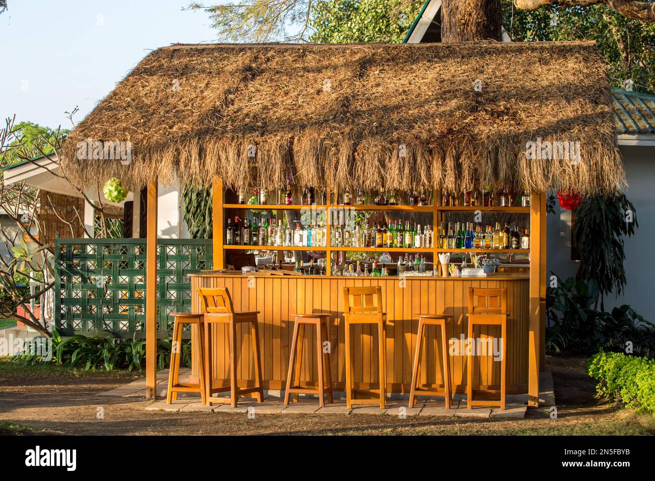 Garden bar at a waterfront hotel along Irrawaddy river in Bagan ...