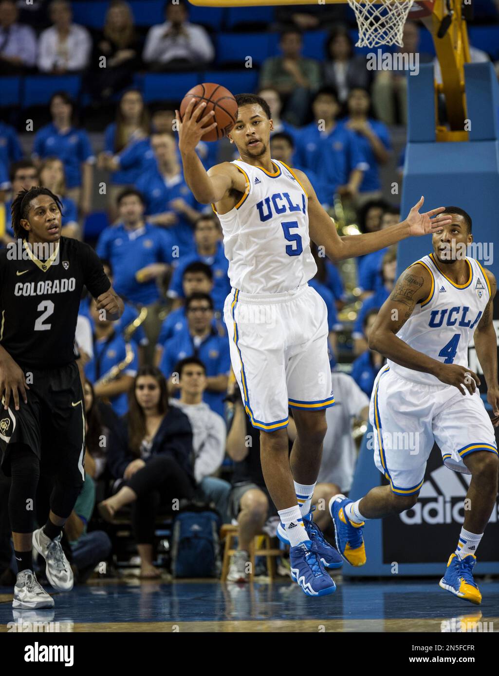 UCLA guard Kyle Anderson, center, plays against Colorado during an NCAA ...