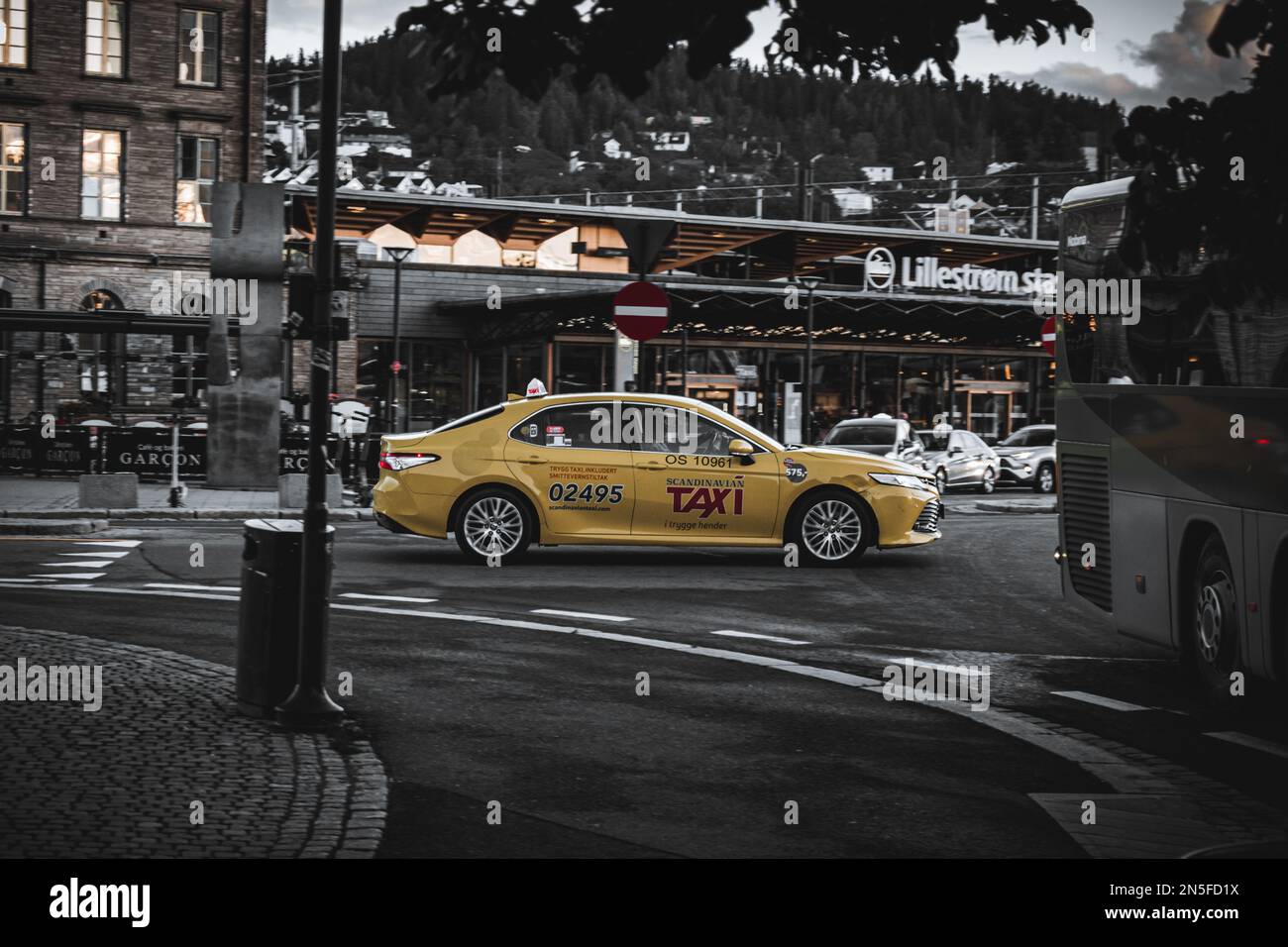 A yellow taxi cab in the street Stock Photo - Alamy