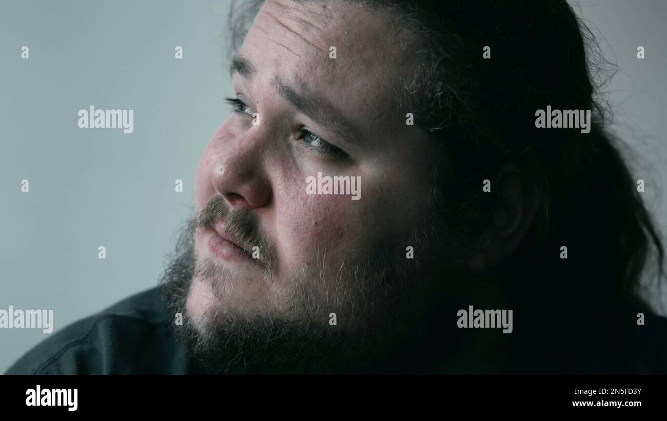 Desperate man crying in despair covering face in shame and regret ...