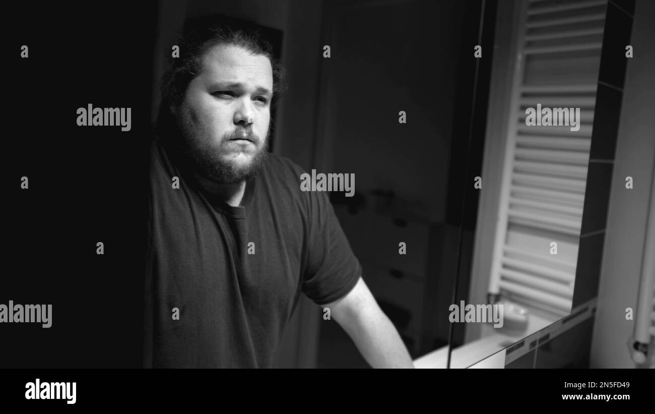 Dramatic person suffering from depression at home in Monochromatic ...