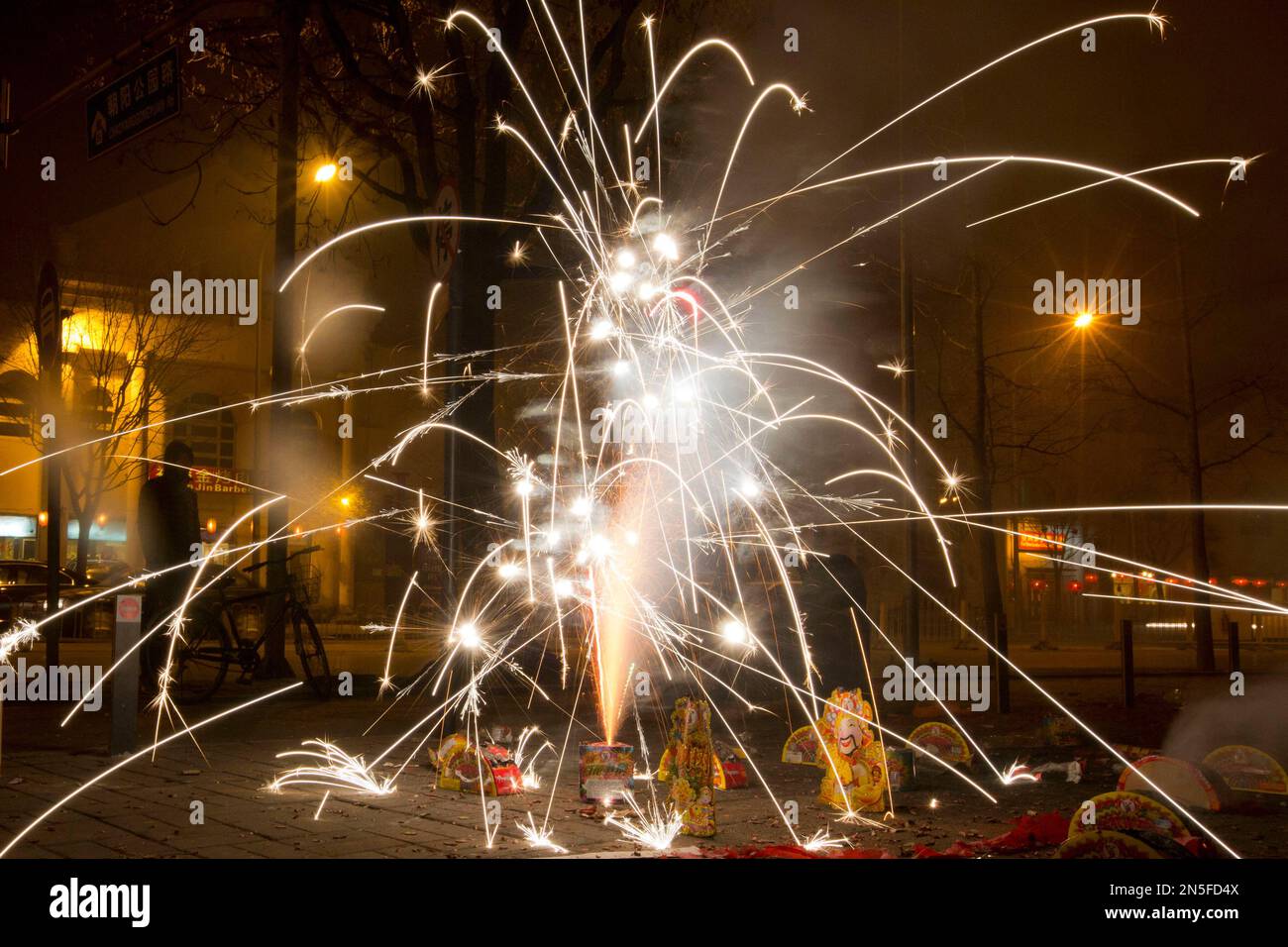 Residents set off fireworks to mark the end of the lunar new year ...