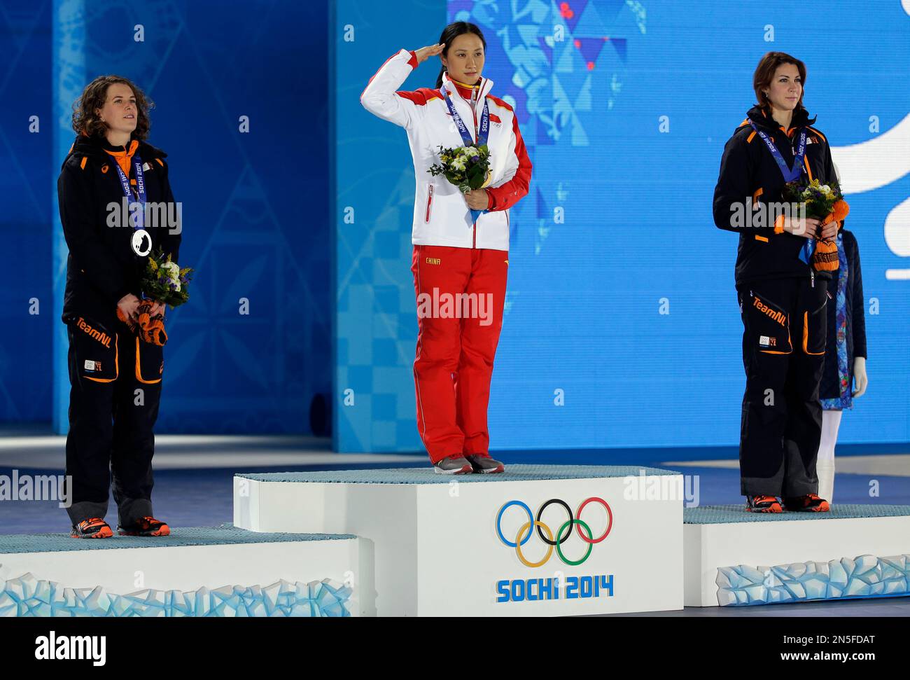 Women's 1,000-meter speedskating gold medalist Zang Hong of China ...