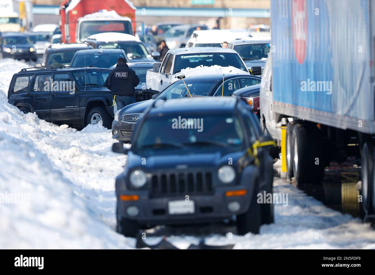 Vehicles are piled up in an accident, Friday, Feb. 14, 2014, in Bensalem, Pa. Traffic accidents ...