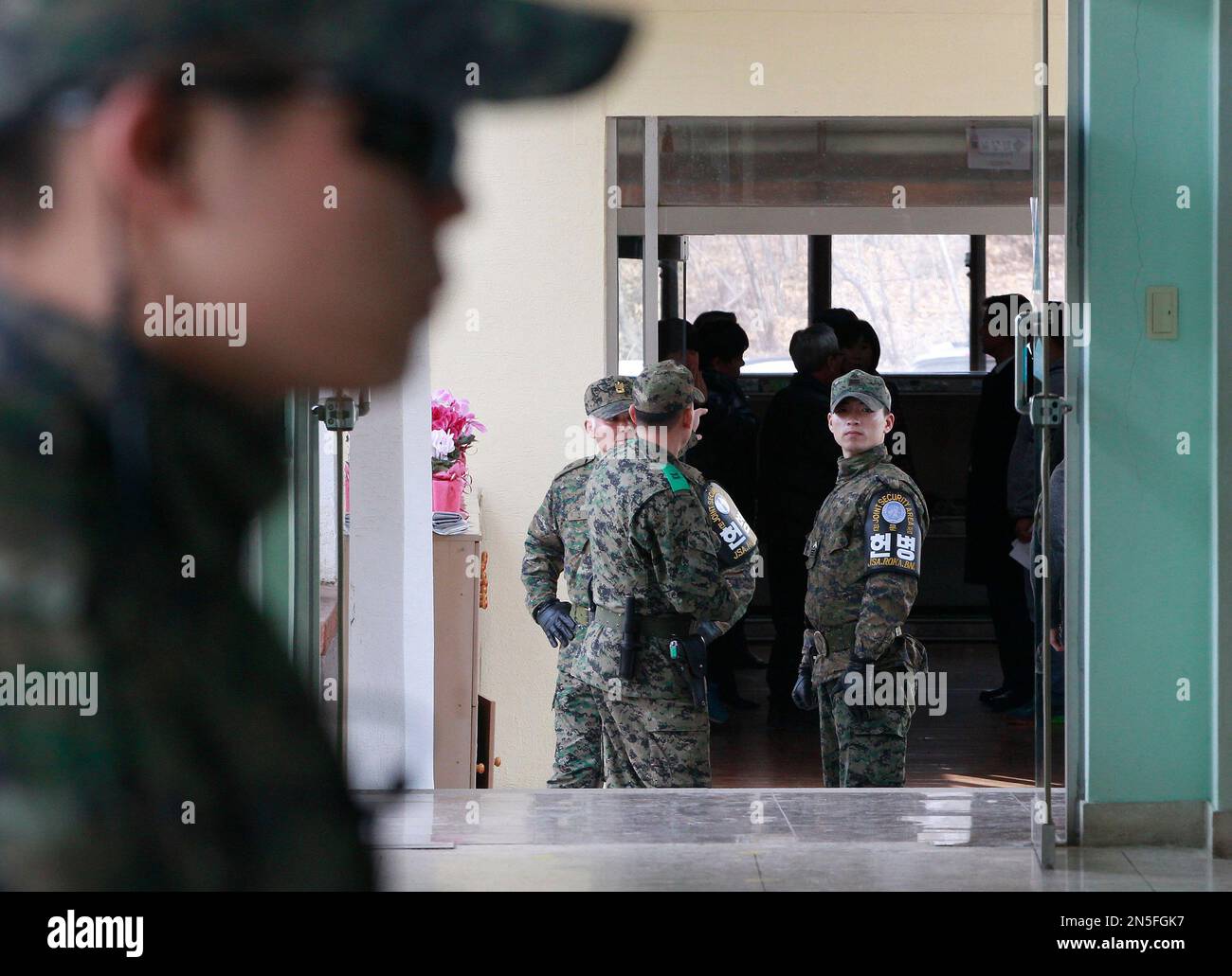 Army soldiers stand guard during a graduation ceremony of Taesungdong ...