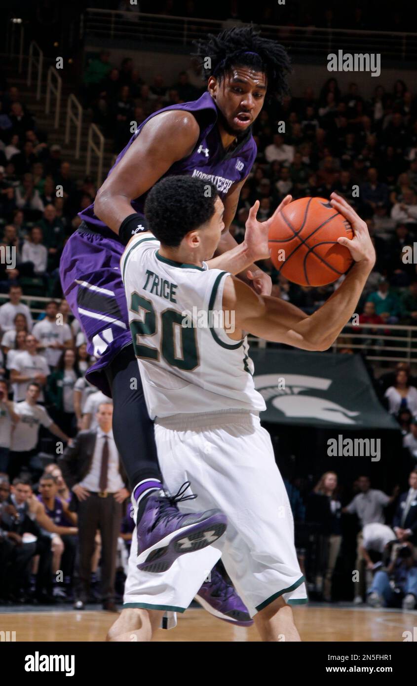 Michigan State's Travis Trice (20) steals the ball from Northwestern's ...