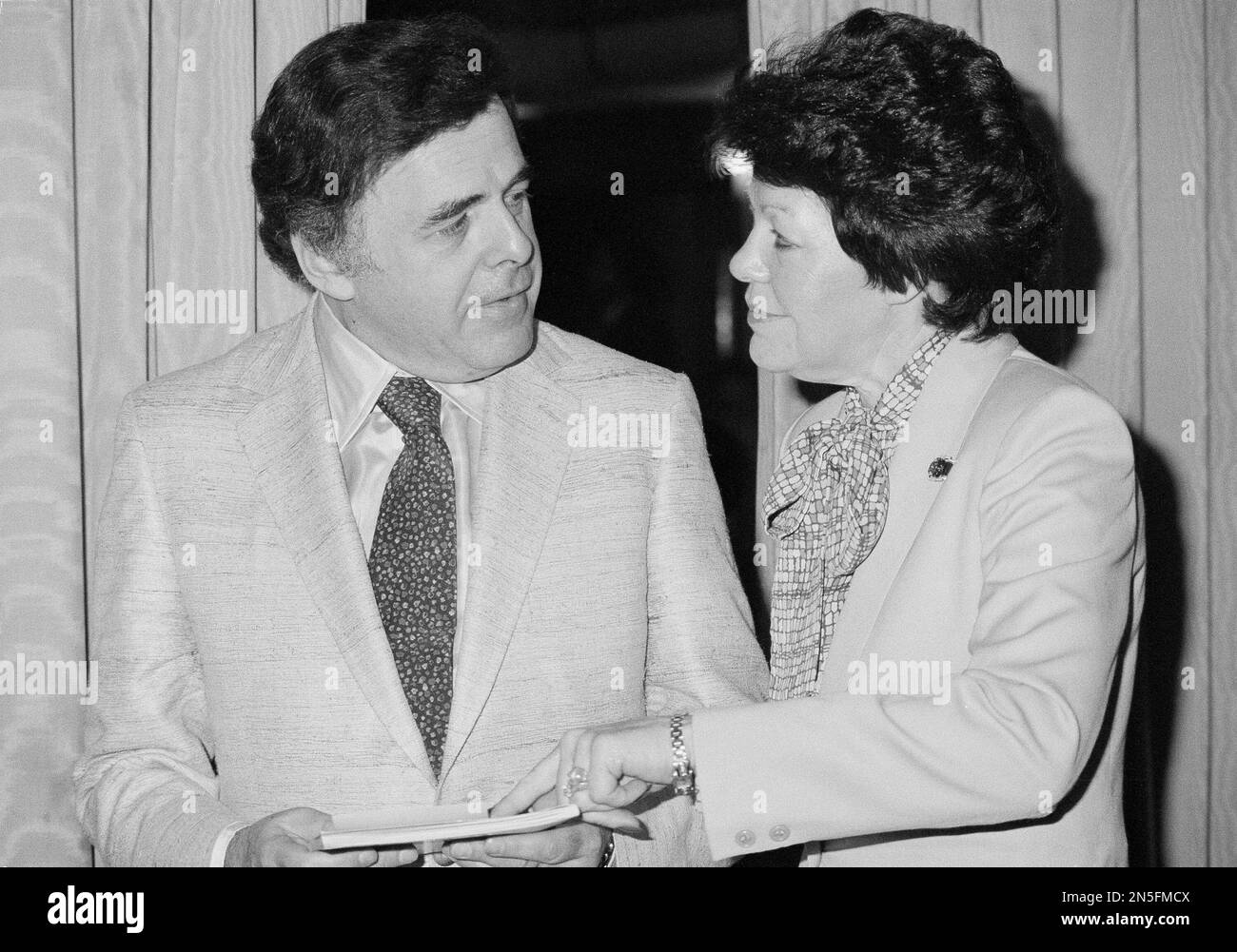 Rare stamp sellers Irwin Weinberg and his wife Jean are shown before ...