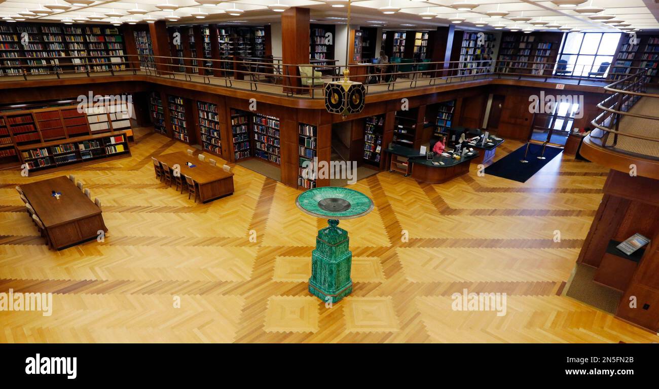 This Feb. 11, 2014 photo shows staff members working the front desk at ...