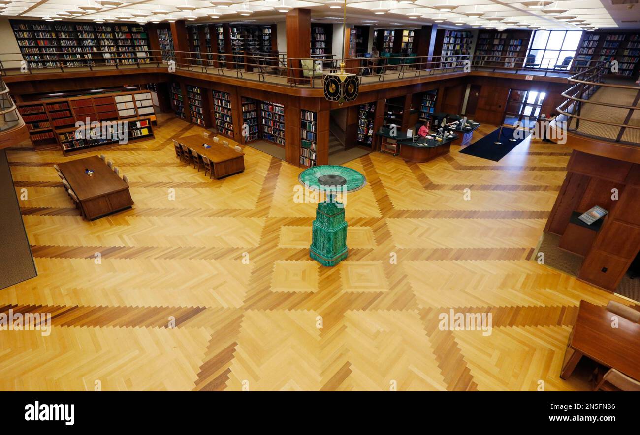 This Feb. 11, 2014 photo shows staff members working the front desk at ...