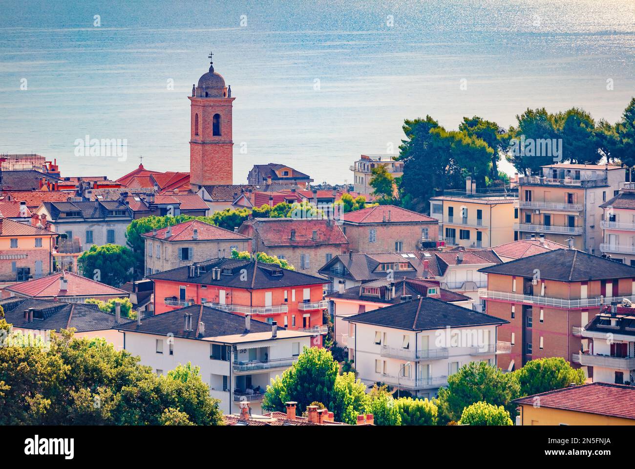 Incredible morning cityscape of Cupra Marittima town with bell of Saint ...