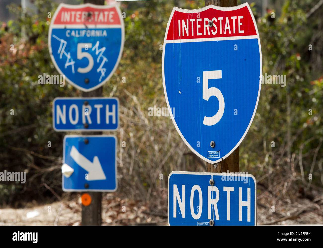 In this Thursday, Feb. 6, 2014 photo, California Interstate 5 signs are ...