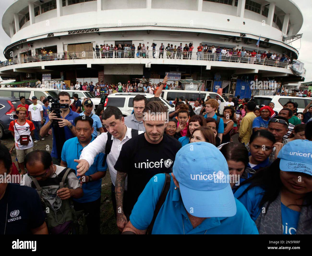 Former England soccer team captain David Beckham interacts with typhoon ...