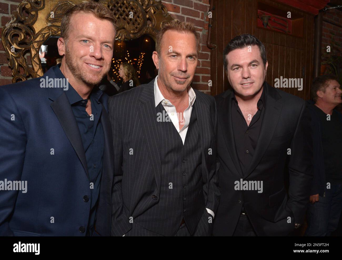 McG, Kevin Costner, and Relativity's Tucker Tooley attend the party for ...