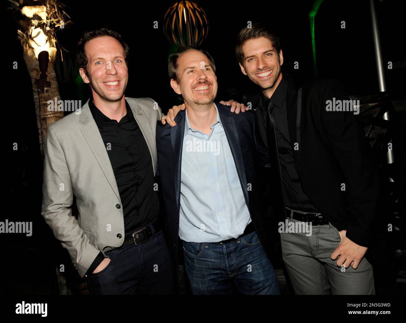 Josh Stolberg, center, writer/director of "The Hungover Games," poses ...