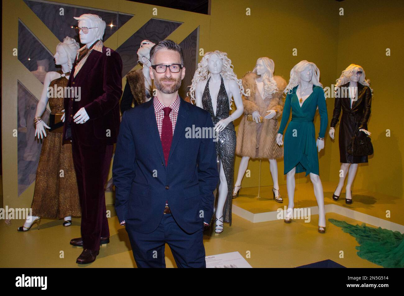 In this Saturday, Feb. 8, 2014 photo, costume designer Michael ...