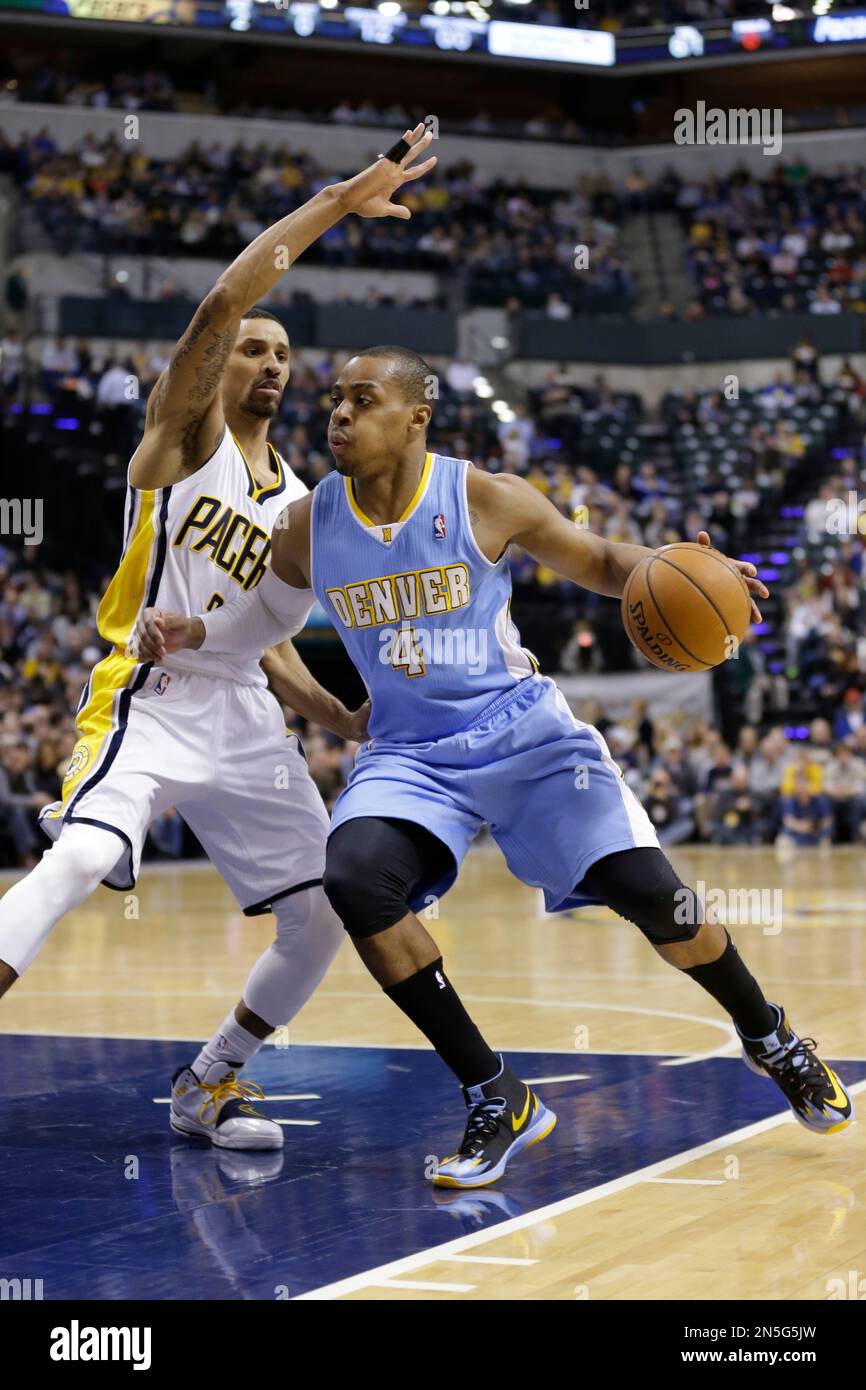 Denver Nuggets guard Randy Foye, right, drives on Indiana Pacers guard ...
