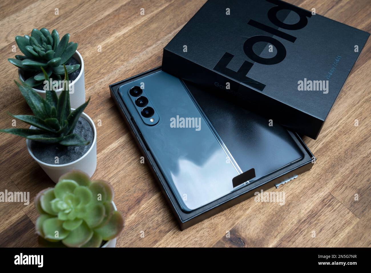Brand new Samsung Galaxy Z Fold 4 in grey-green color. The device is in ...